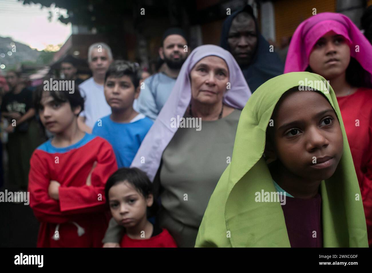 Resident take a part in a Way of the Cross reenactment as part of Holy ...