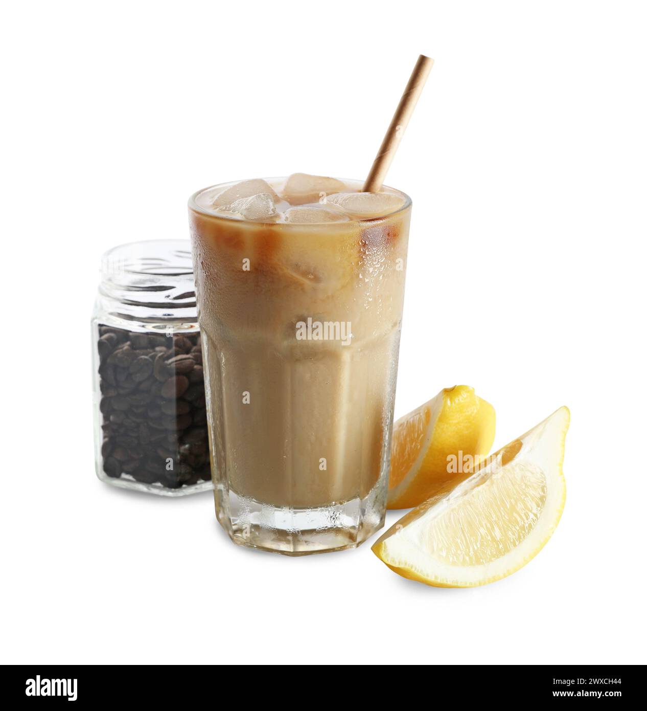 Iced coffee with milk, cut lemon and jar of roasted beans isolated on ...