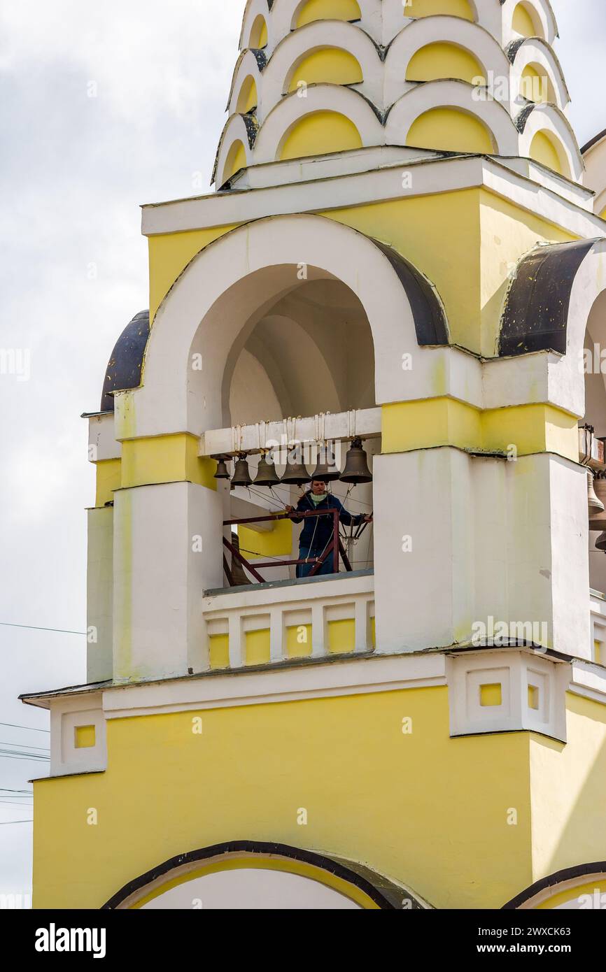 Bell ringing woman church hi-res stock photography and images - Alamy