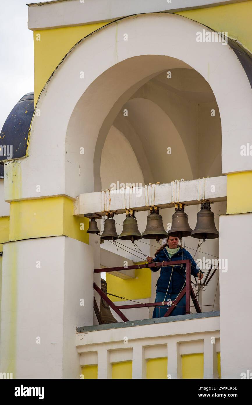 Bell ringing woman church hi-res stock photography and images - Alamy