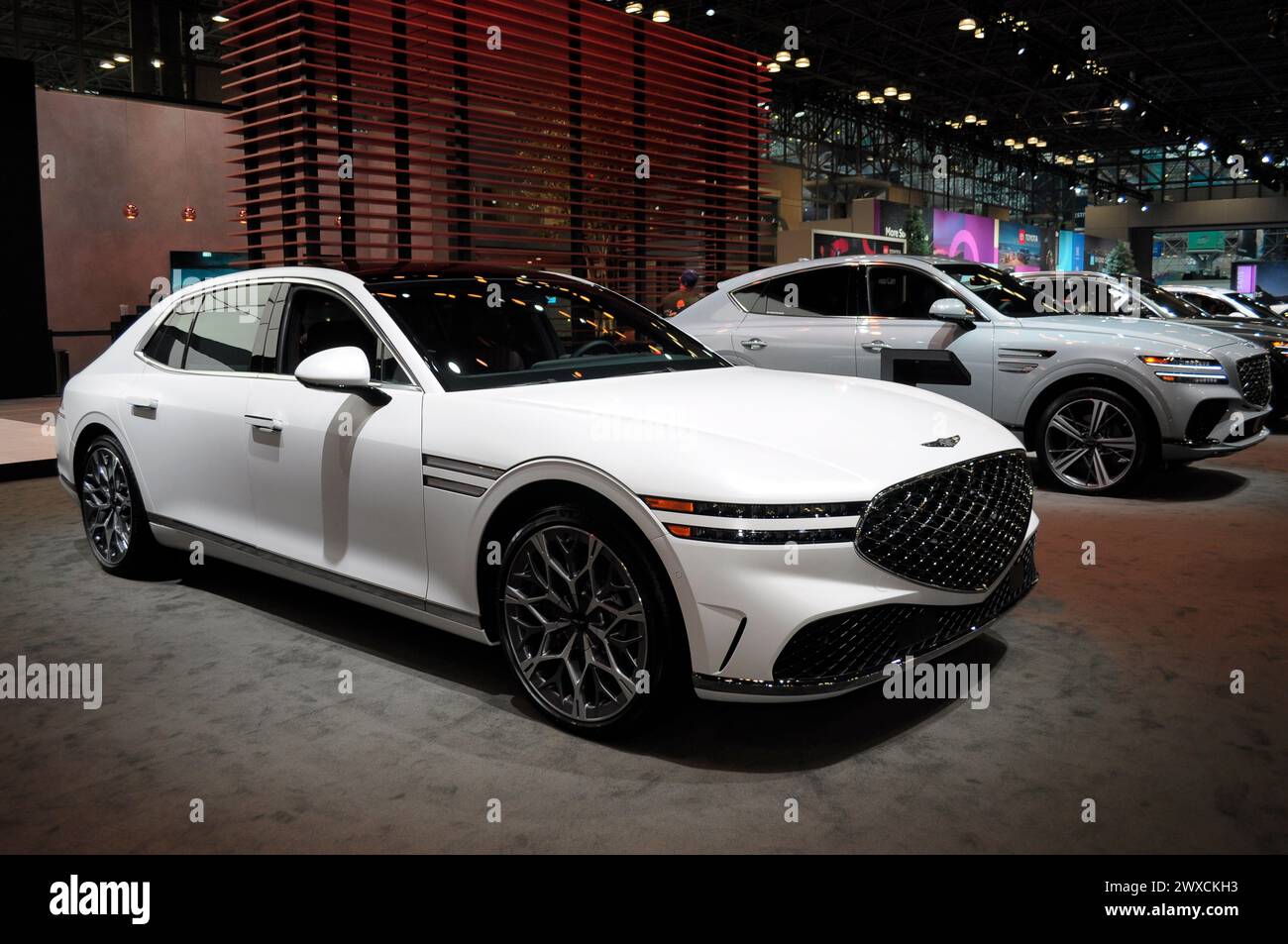 A Genesis G90 vehicle, left, is seen next to other Genesis vehicles on the second media day at ...