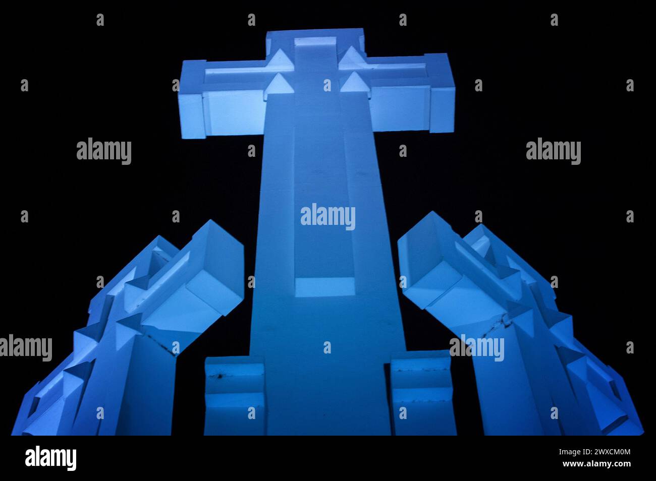 Three crosses monument at night with blue light in Vilnius, Lithuania ...