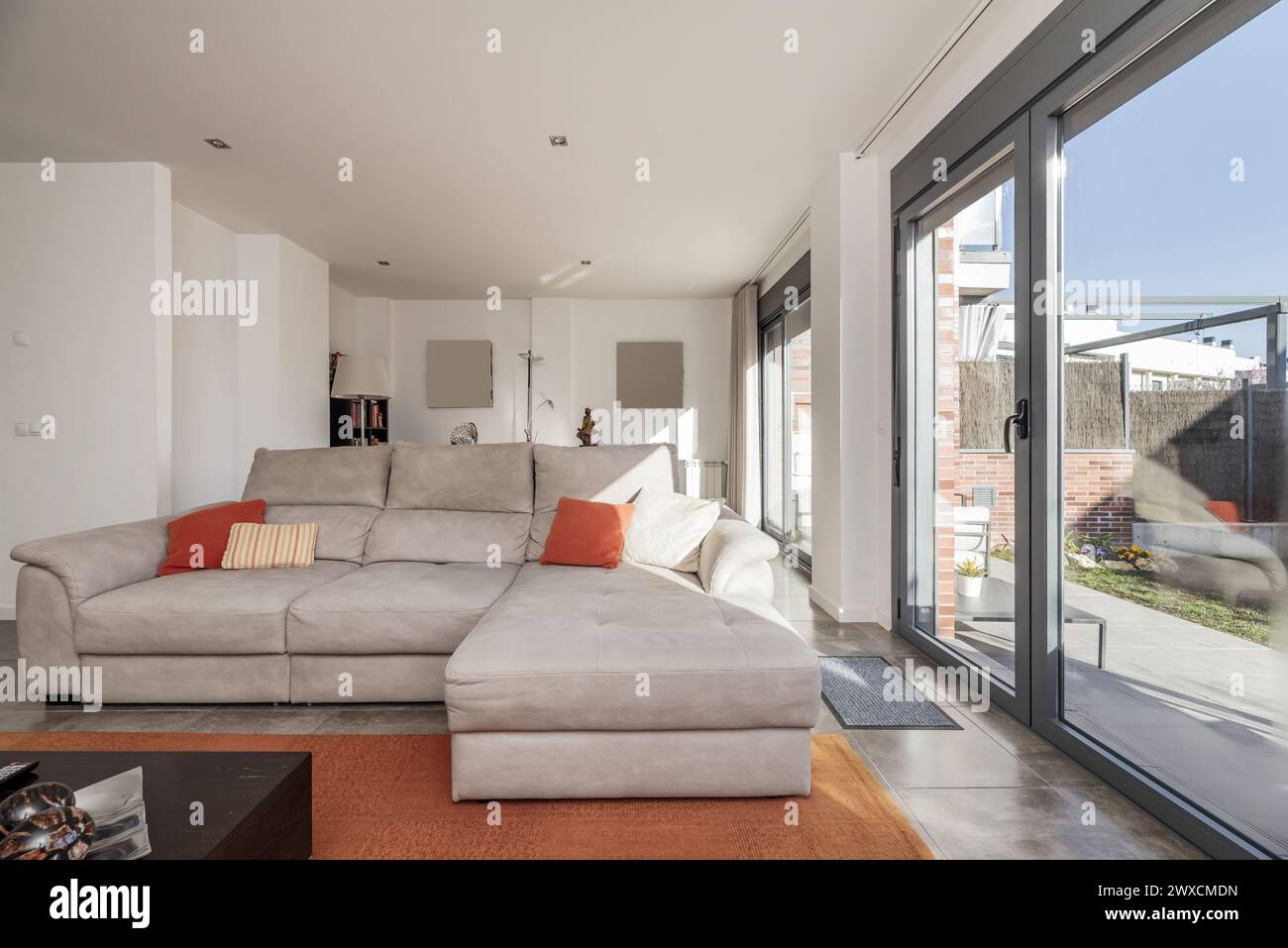 Living room on the ground floor of a single-family house with a large ...
