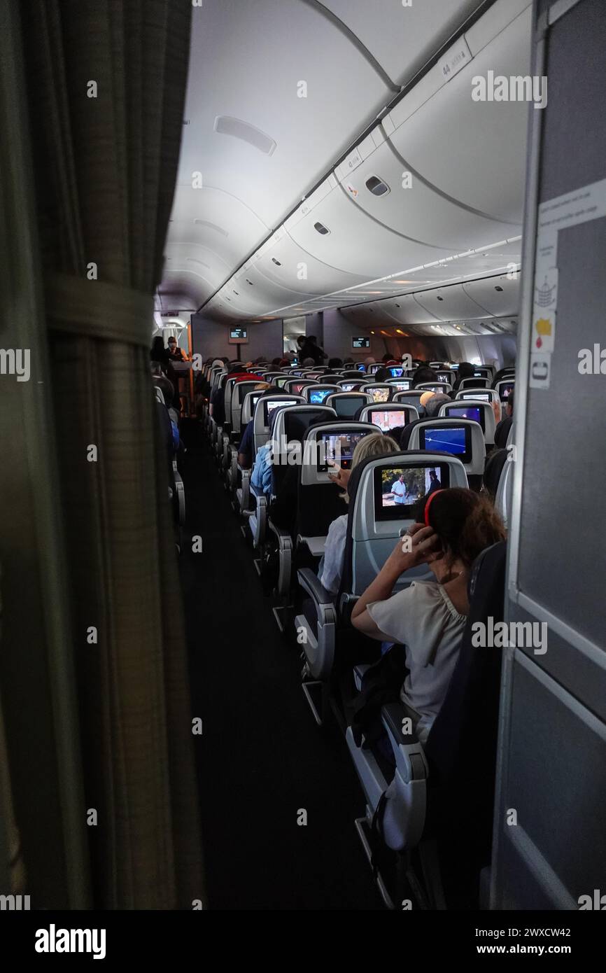 Inside busy airplane hi-res stock photography and images - Alamy