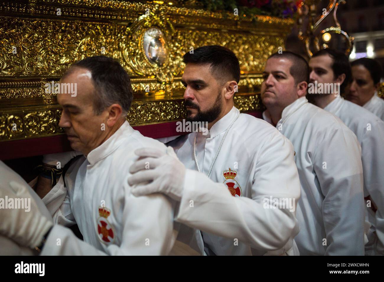 Madrid, Spain. 29th Mar, 2024. Carriers from the Brotherhood of Our ...