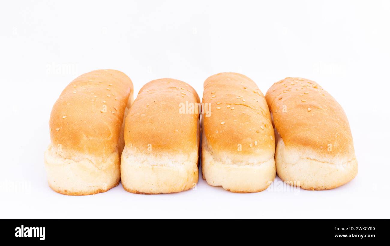 Four bun breads on white background Stock Photo - Alamy