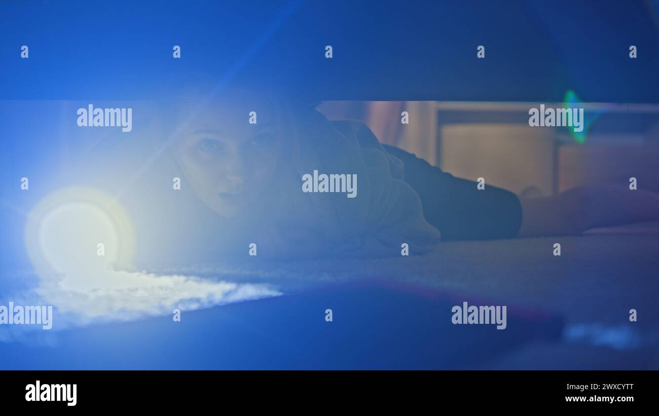 Caucasian teenager comes to modern light room. Young beautiful girl ...