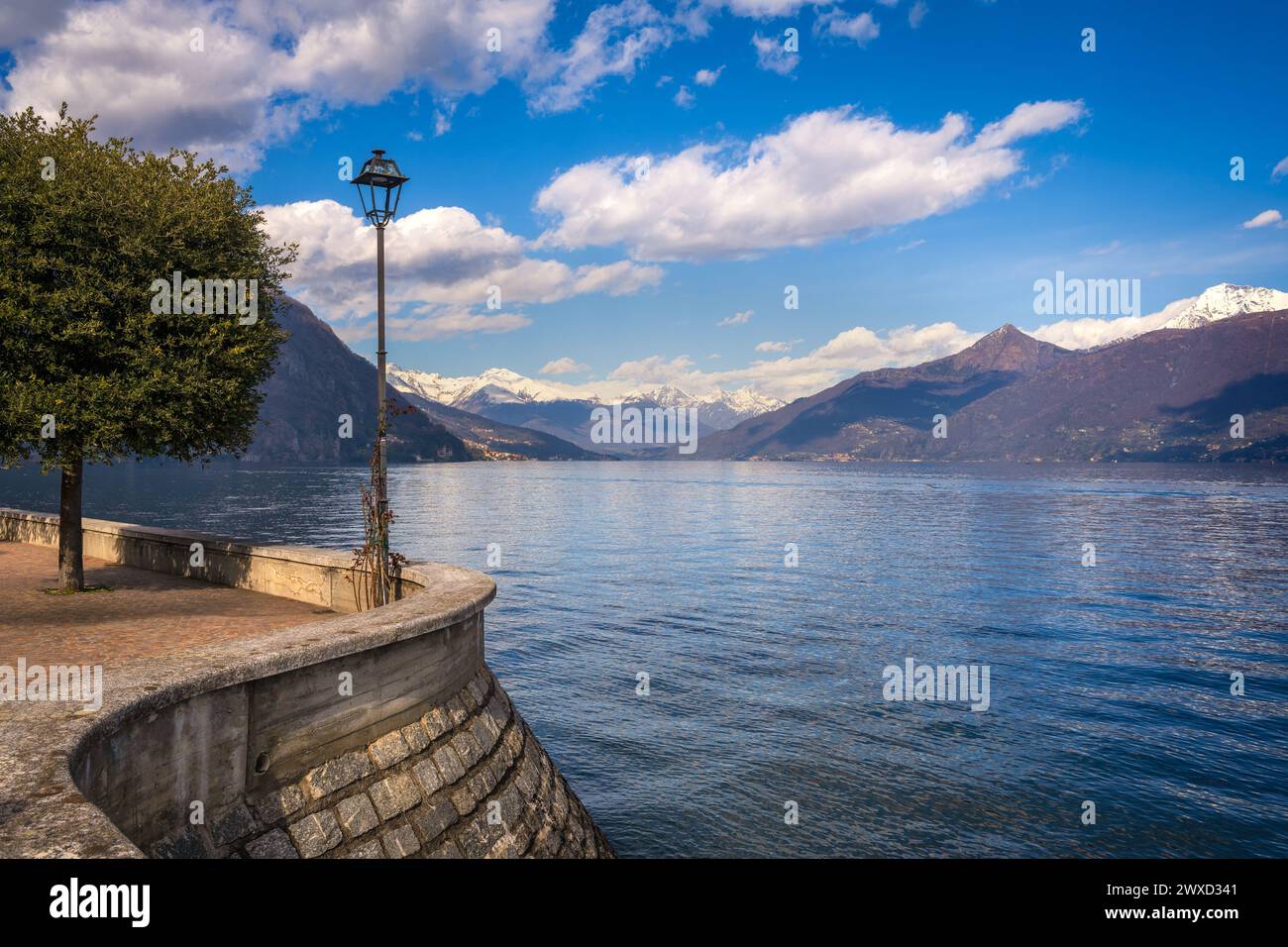 View on Lake Como, Italy with snow covered mountains in the background ...