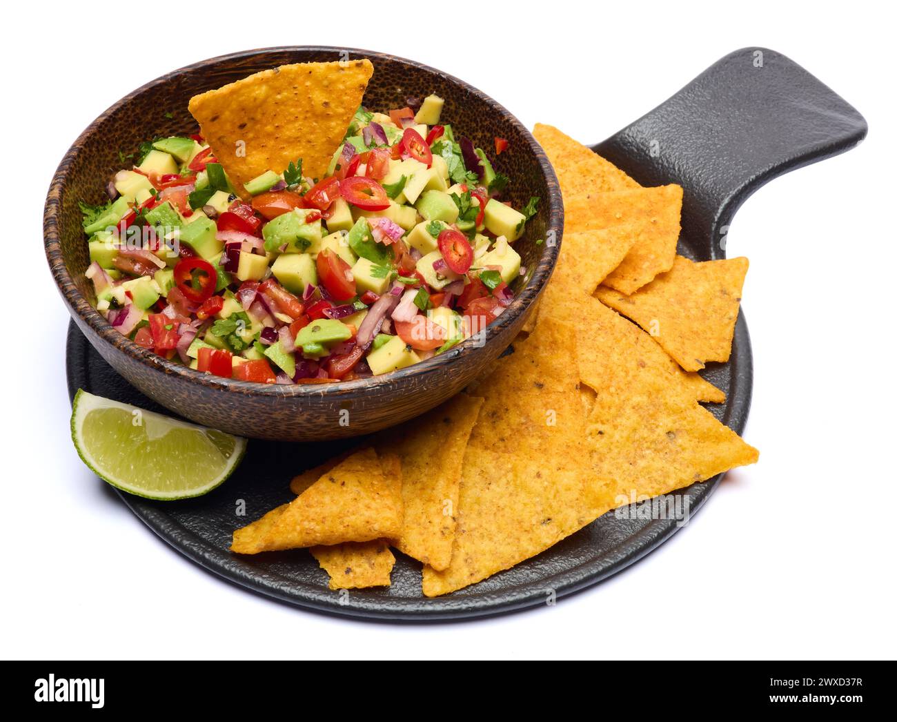 traditional salsa dip snack in wooden bowl and corn nacho chips ...