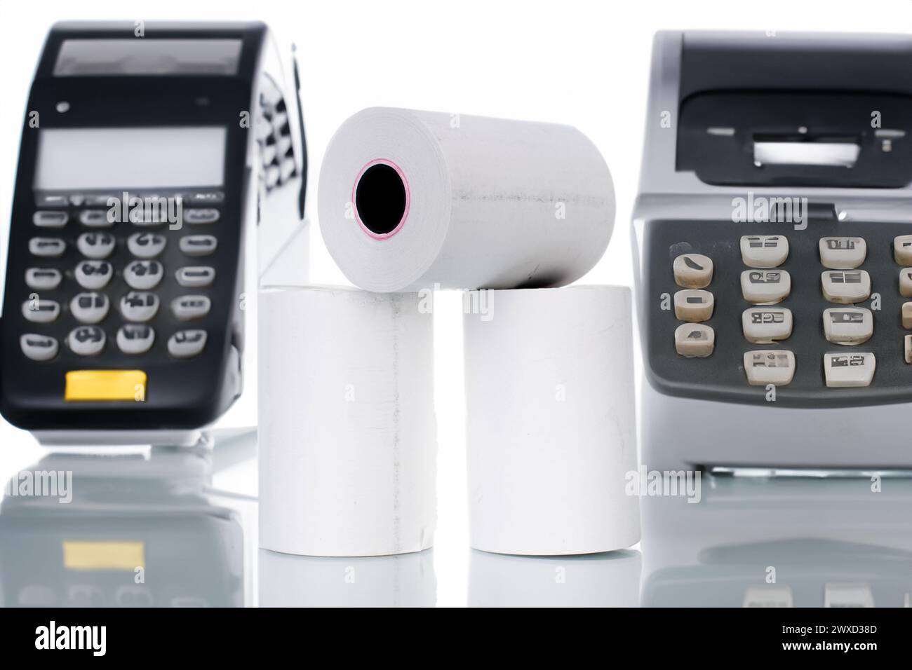 Several rolls of paper cash register tape on the background of cash ... Several rolls of paper cash register tape on the background of cash ...