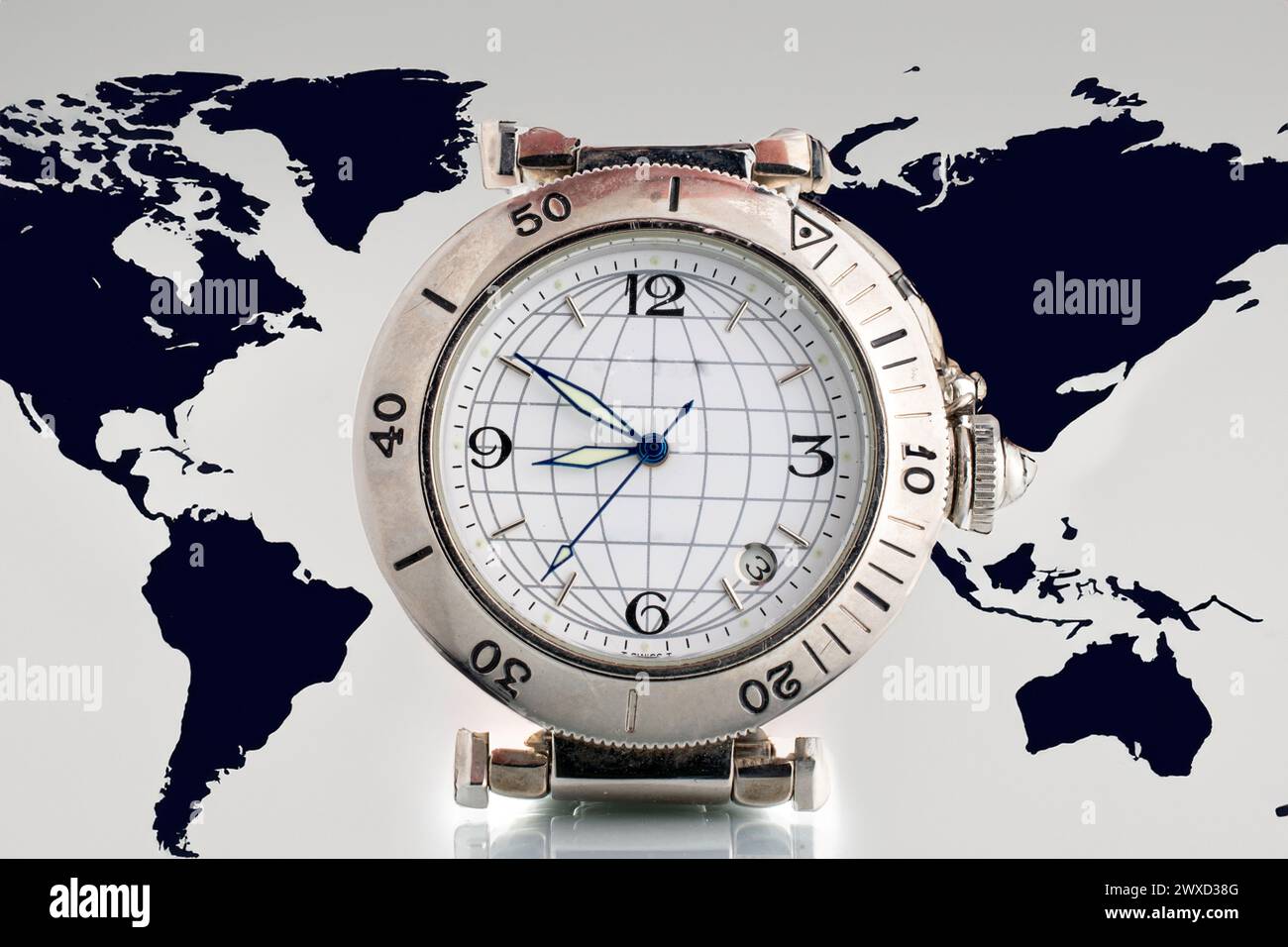 One time dial on the background of a world map Stock Photo - Alamy