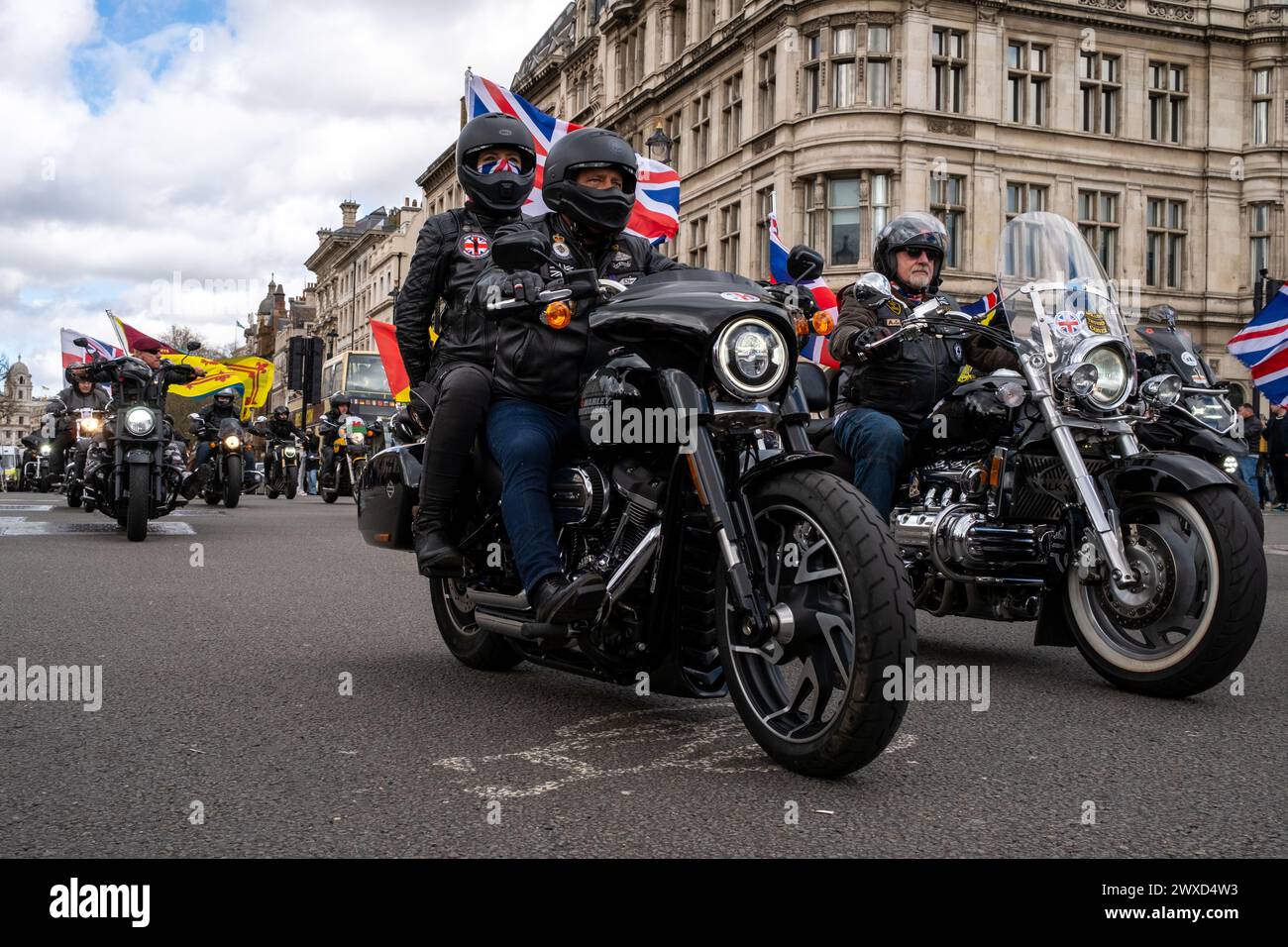 Armed Forces Veterans ride their motorcycles through Central London in ...