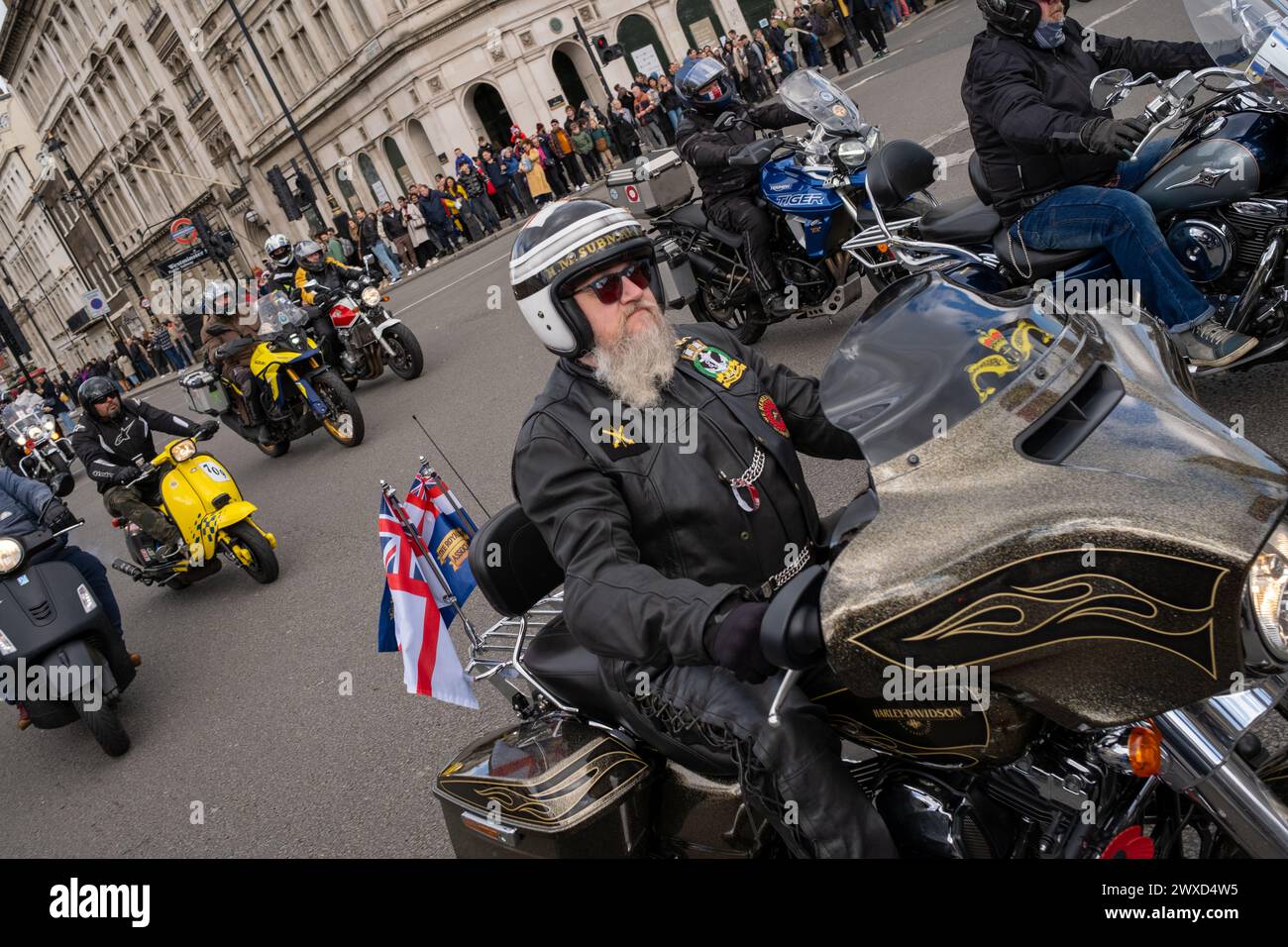 Armed Forces Veterans ride their motorcycles through Central London in ...