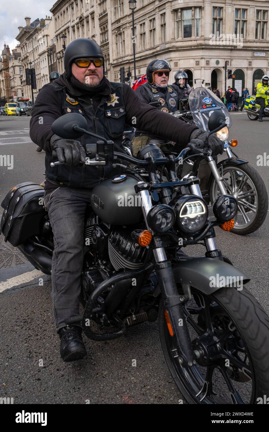 Armed Forces Veterans ride their motorcycles through Central London in ...