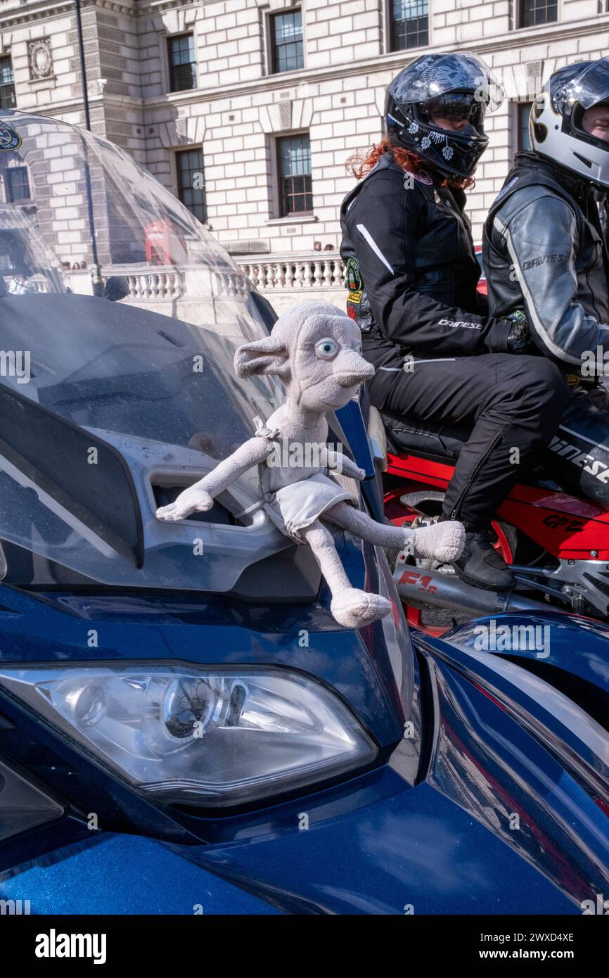 Armed Forces Veterans ride their motorcycles through Central London in ...