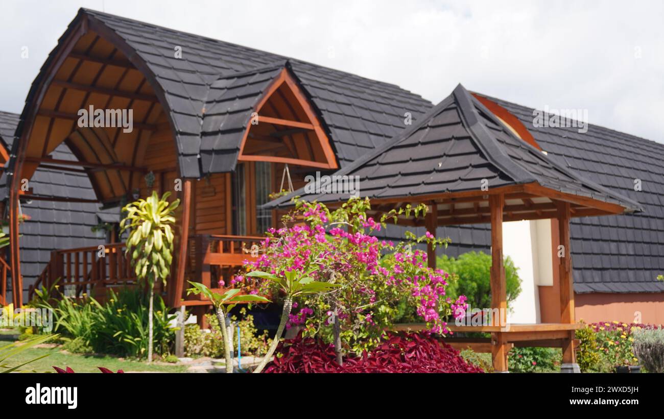 Lodging at the foot of Mount Rinjani which is shaped like a traditional ...