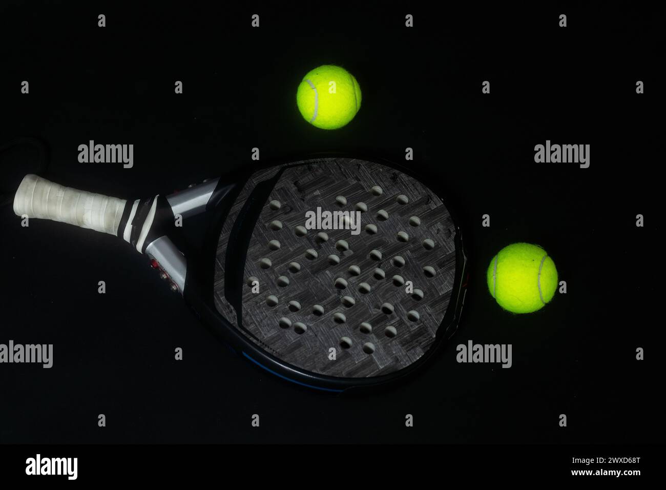 Isolated paddle tennis objects black background Stock Photo - Alamy