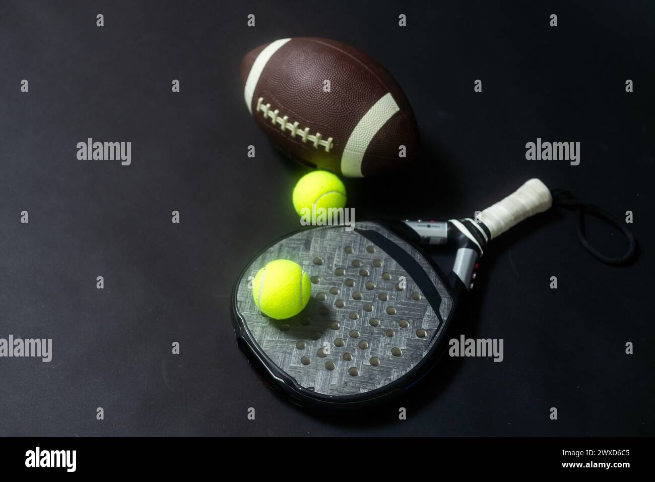 Set of sport equipment on floor, padel tennis, ball rugby Stock Photo ...