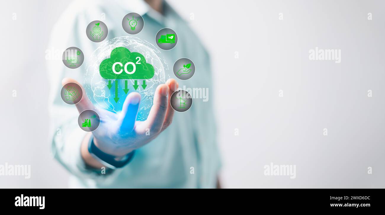 Reduce CO2 emission concept in hand for environmental, global warming ...