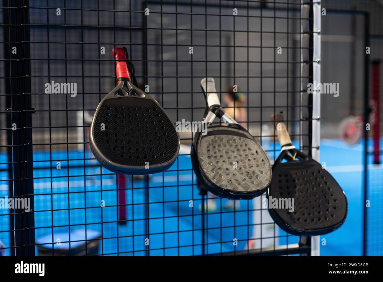 Paddle objects on blue court Stock Photo - Alamy