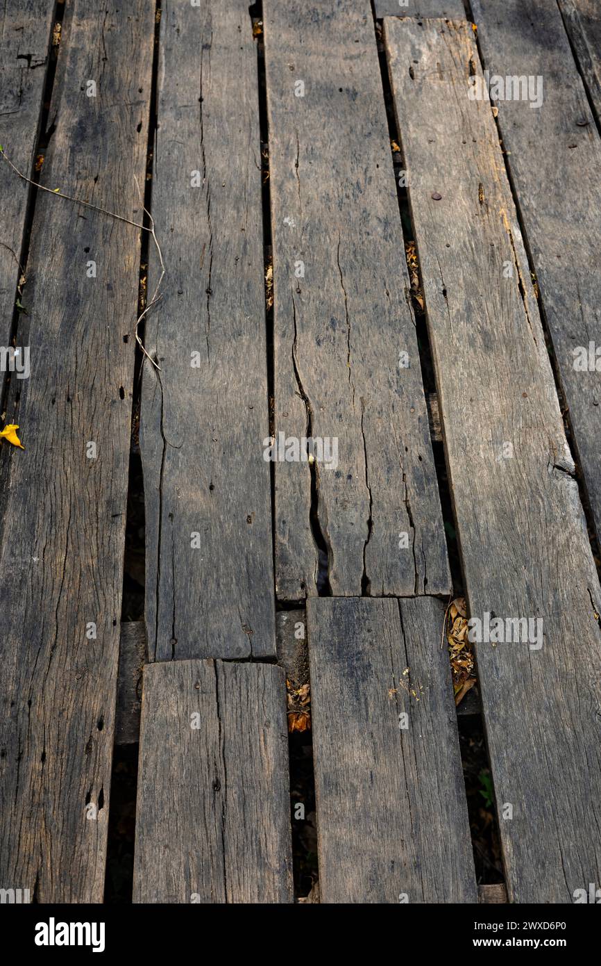 Close up of old abandoned rickety foot bridge. Old wood texture ...
