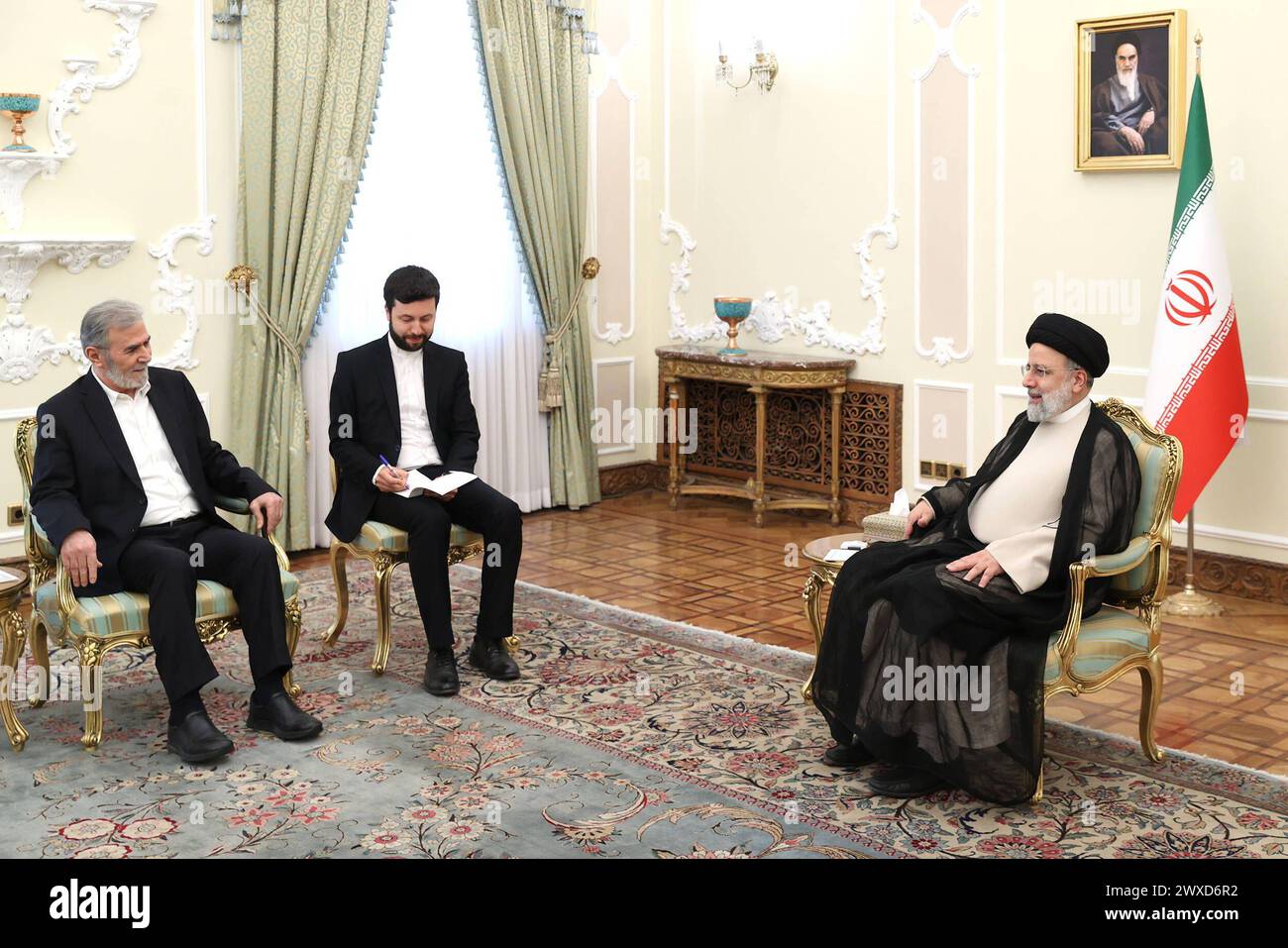 Iranian president Ebrahim Raisi meet with Ziad al-Nakhalah, leader of ...