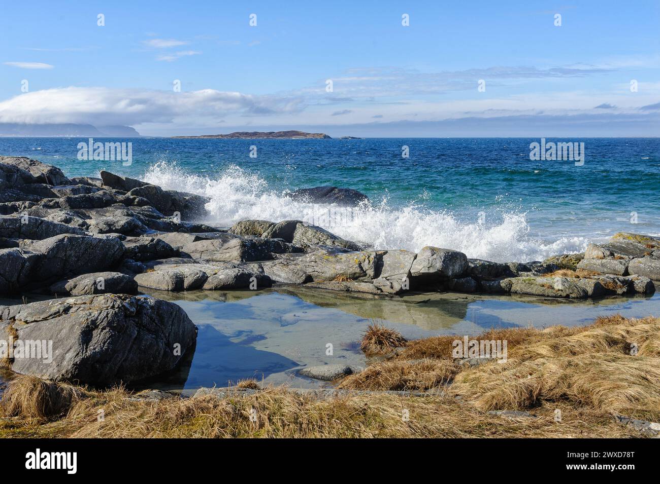 Crashing waves and gentle tides create a beautiful coastal landscape ...