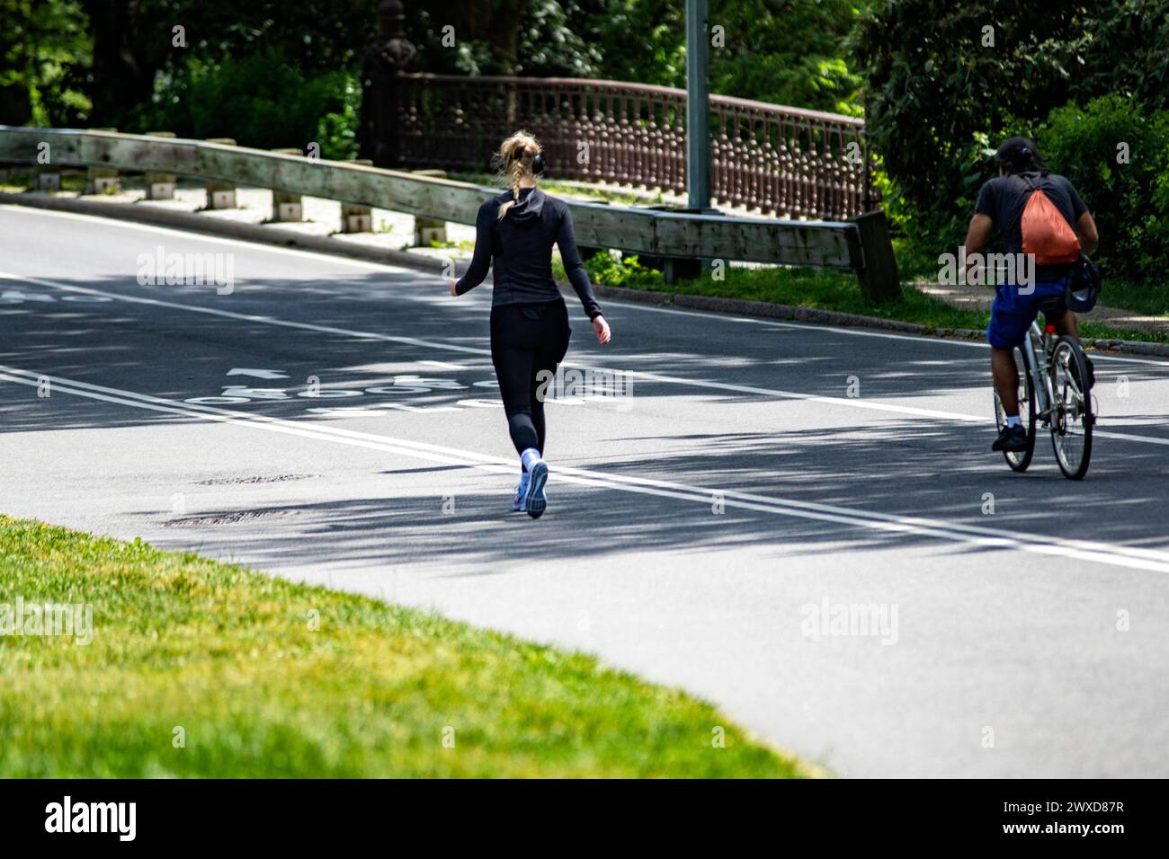 People playing sports in Central Park which is a public urban park ...