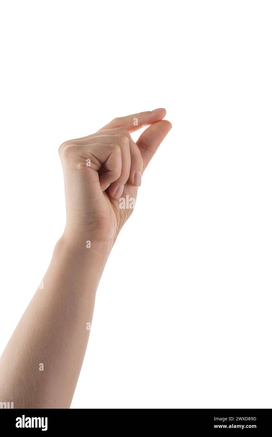 Young woman hand holding something with fingers isolated on white background, high detailed ...