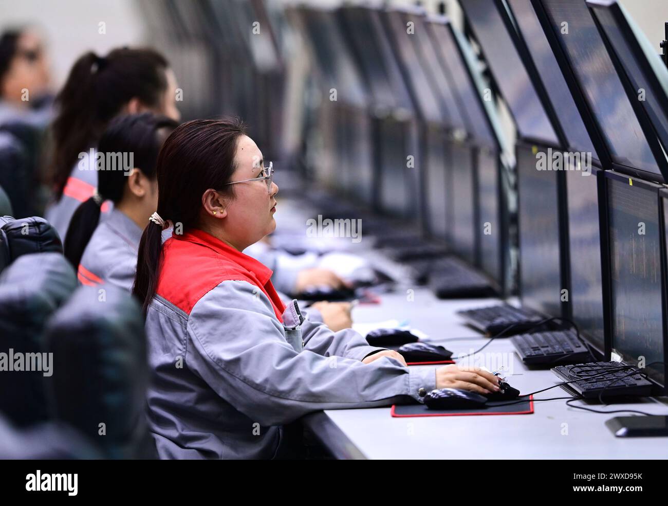 WUHAI, CHINA - MARCH 29, 2024 - Technicians are viewing real-time data ...