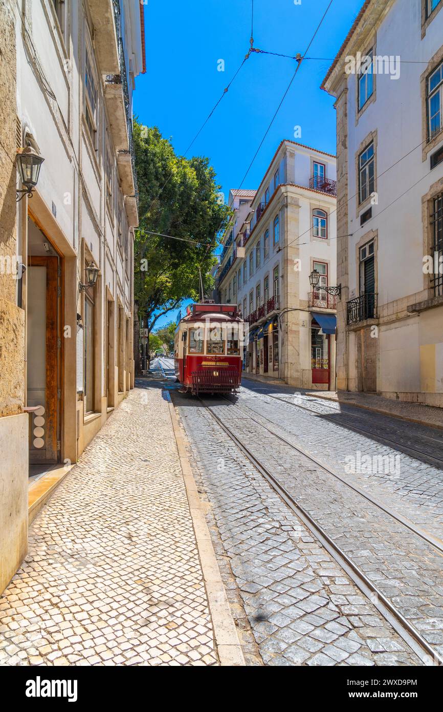 Famous and typical old red Portuguese tram, beautifully decorated ...