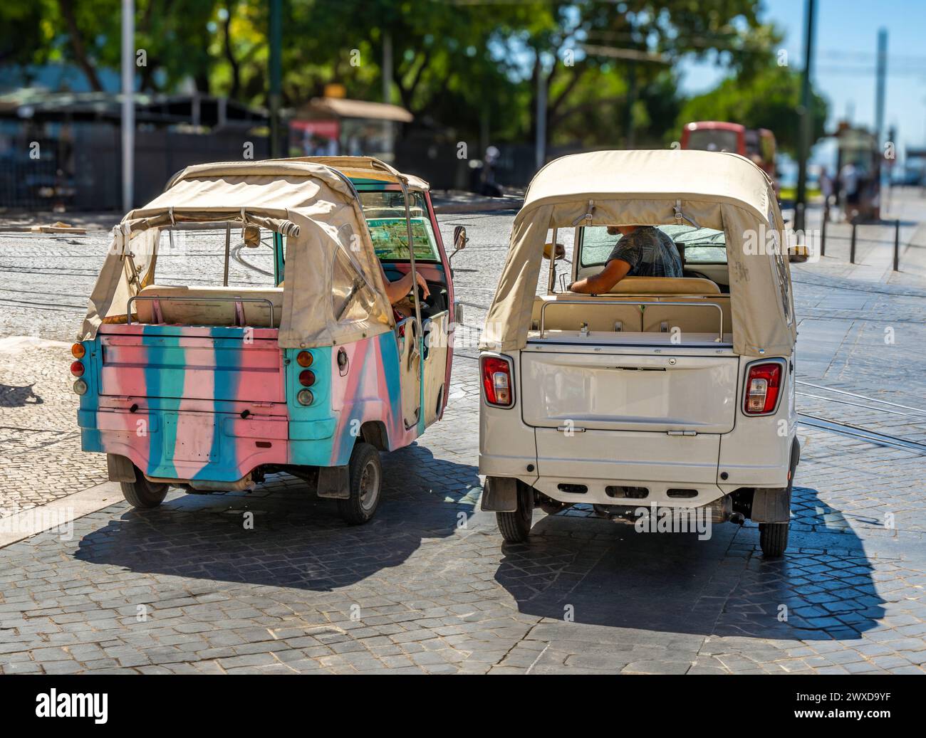 Two Piaggio Ape Calessino 200 three-wheeled tourist Tuk tuks parked on ...