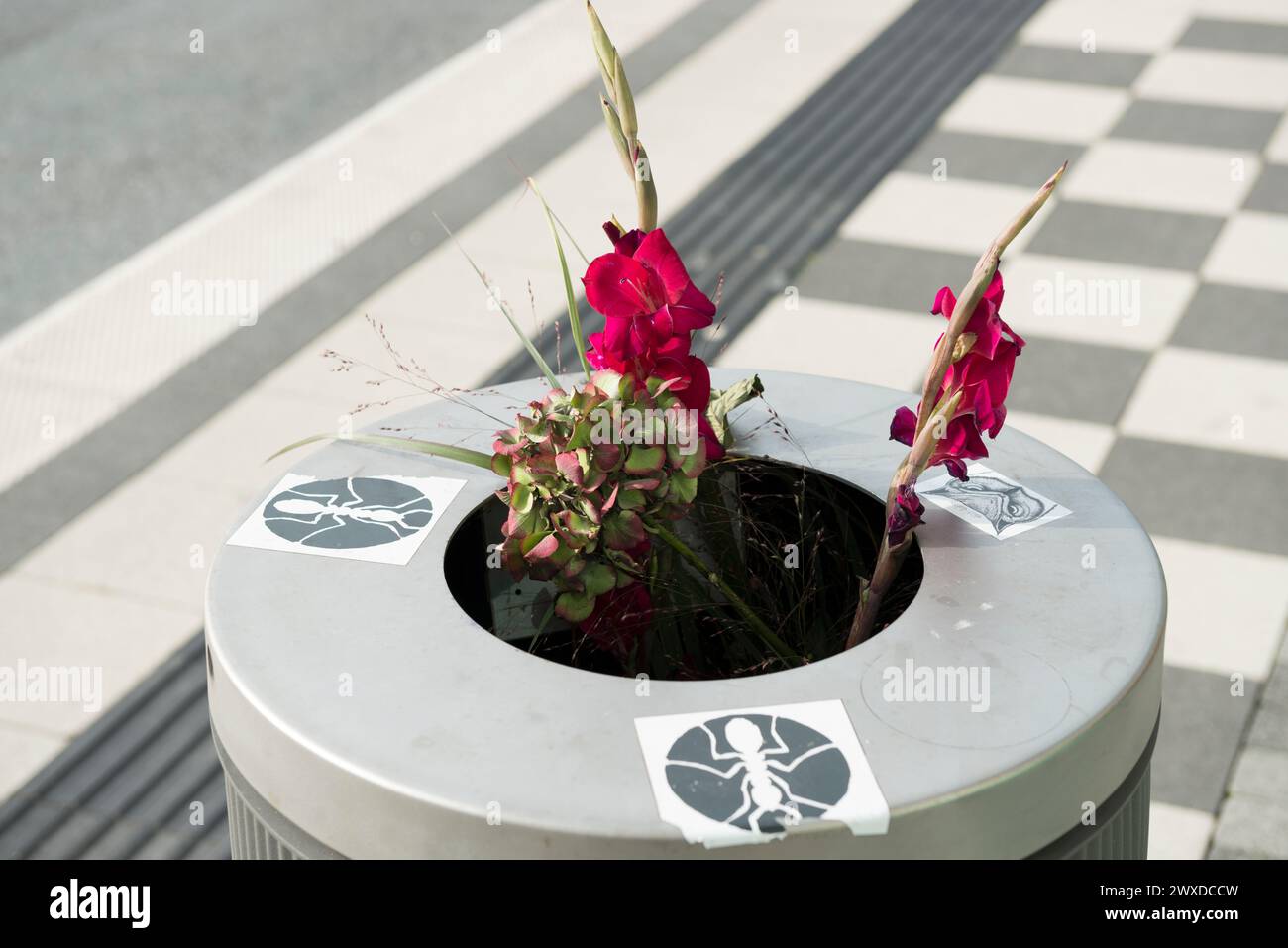 Flowers in a bin Stock Photo - Alamy