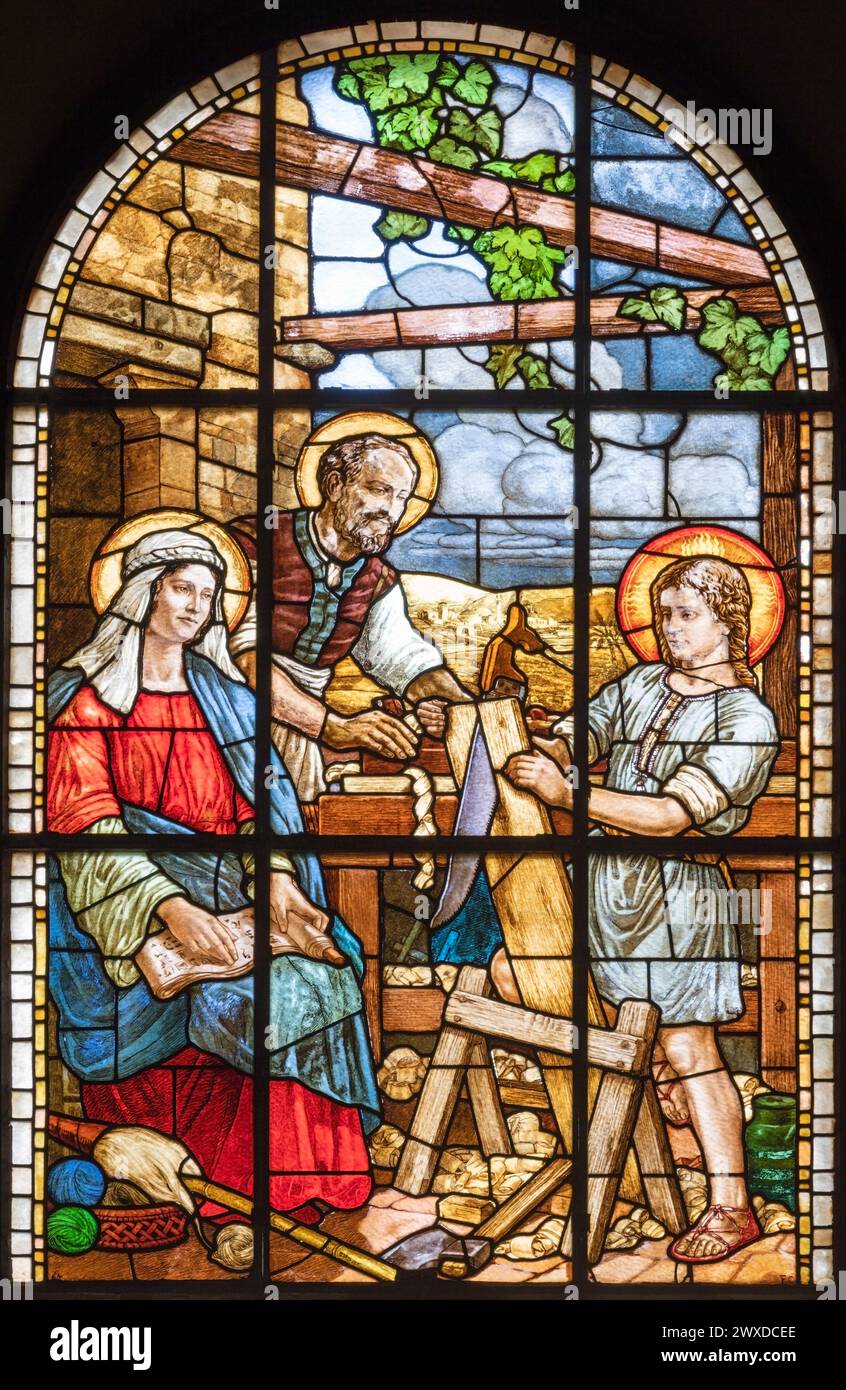 MILAN, ITALY - MARCH 6, 2024: The Holy Family in the stained glass of ...
