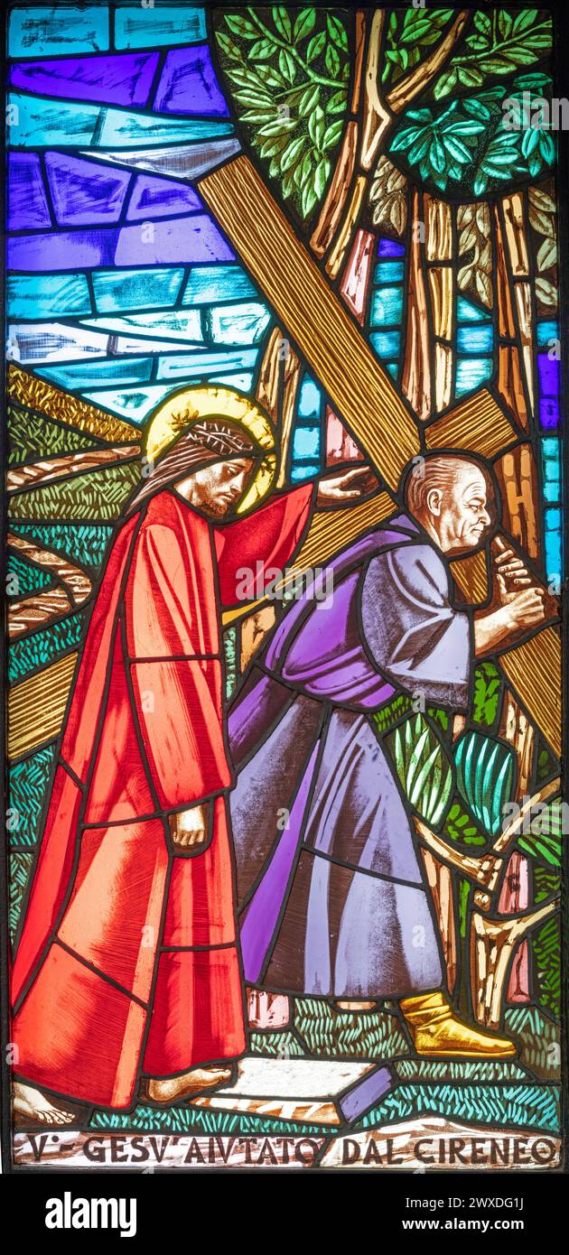 MILAN, ITALY - MARCH 48 2024: The Simon of Cyrene helps Jesus carry the ...