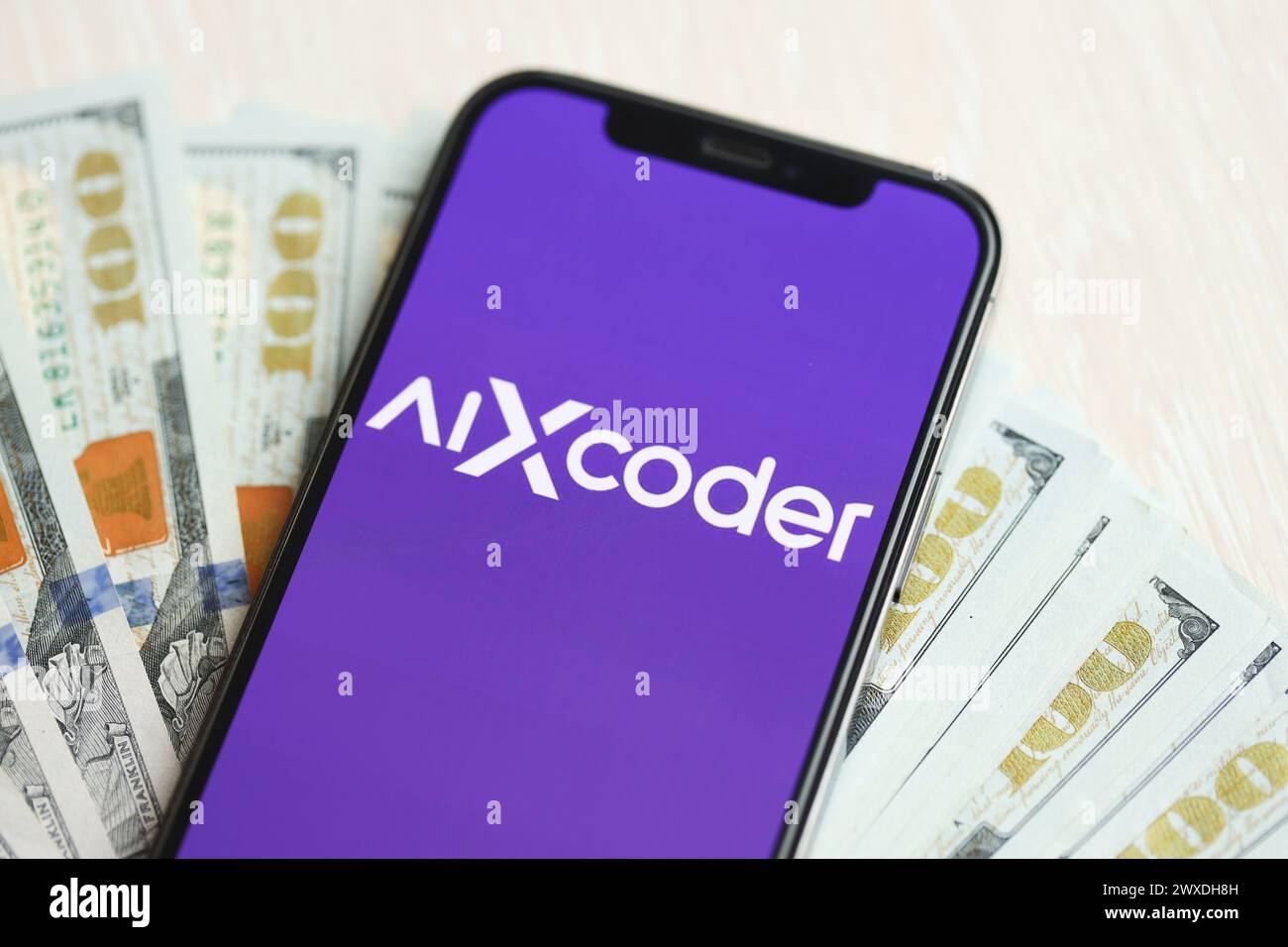 KYIV, UKRAINE - MARCH 17, 2024 AIXcoder logo on iPhone display screen ...