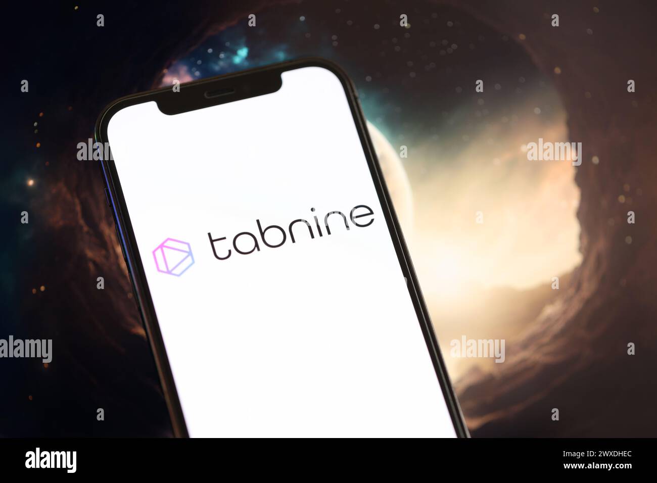 KYIV, UKRAINE - MARCH 17, 2024 Tabnine logo on iPhone display screen ...