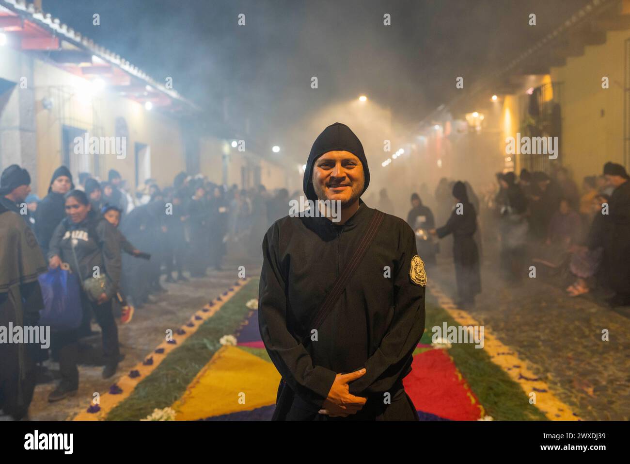 Leonel Gonzalez, a penitent knows as cucurucho pose for a photo during ...
