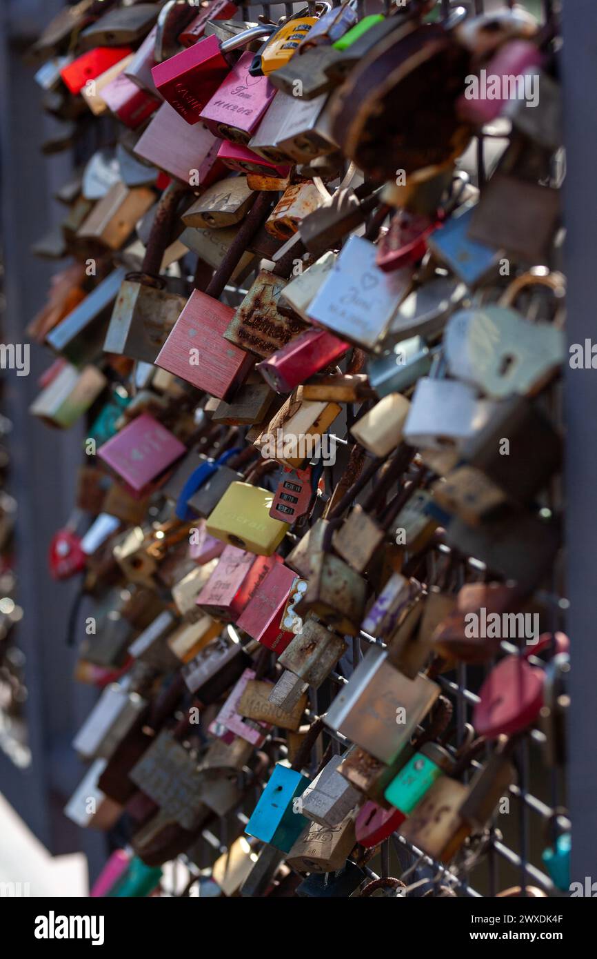 Love lock bridge at Katajanokka with many locks. Couples putting locks ...