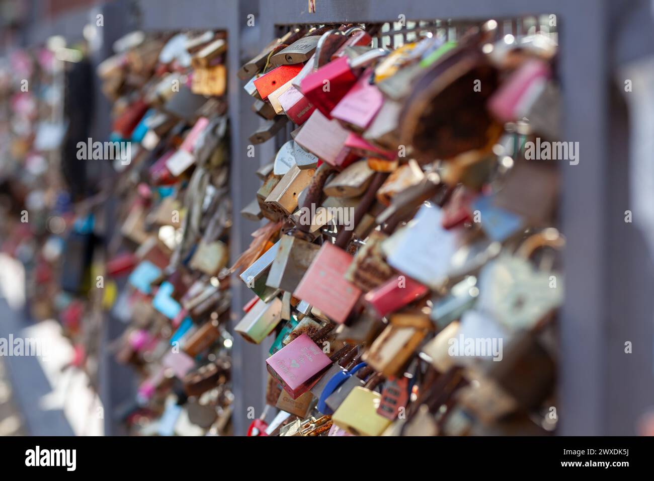 Love lock bridge at Katajanokka with many locks. Couples putting locks ...