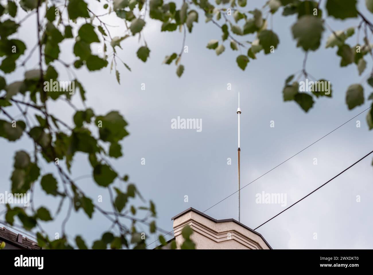Lightning rod on a roof in a rainy day Stock Photo - Alamy