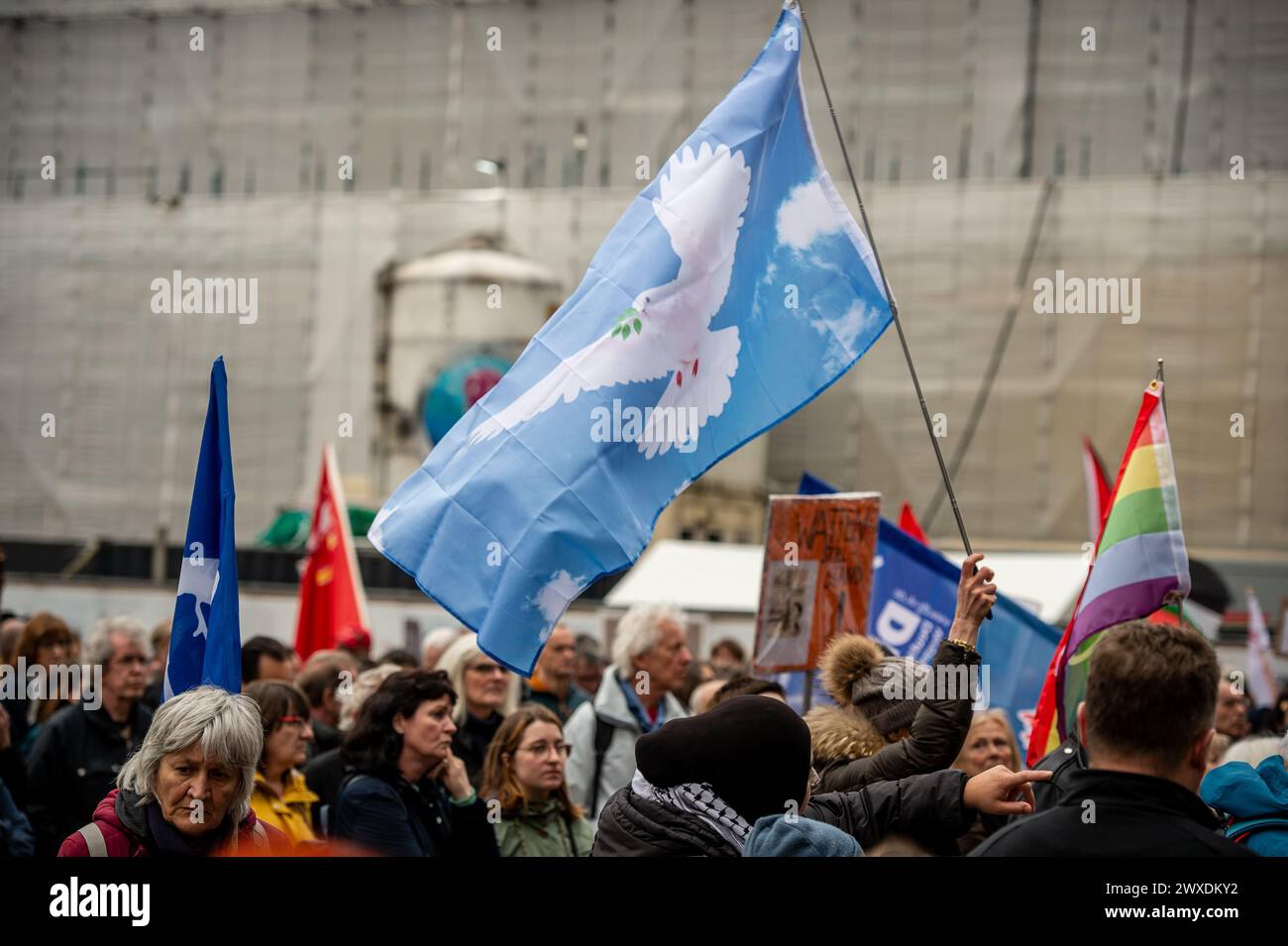 Cologne, Germany. 30th Mar, 2024. Several hundred people gather on ...