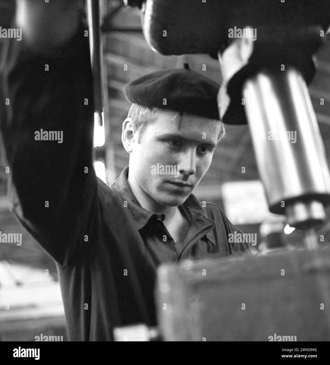 Socialist Republic of Romania in the 1970s. Portrait of a young worker ...