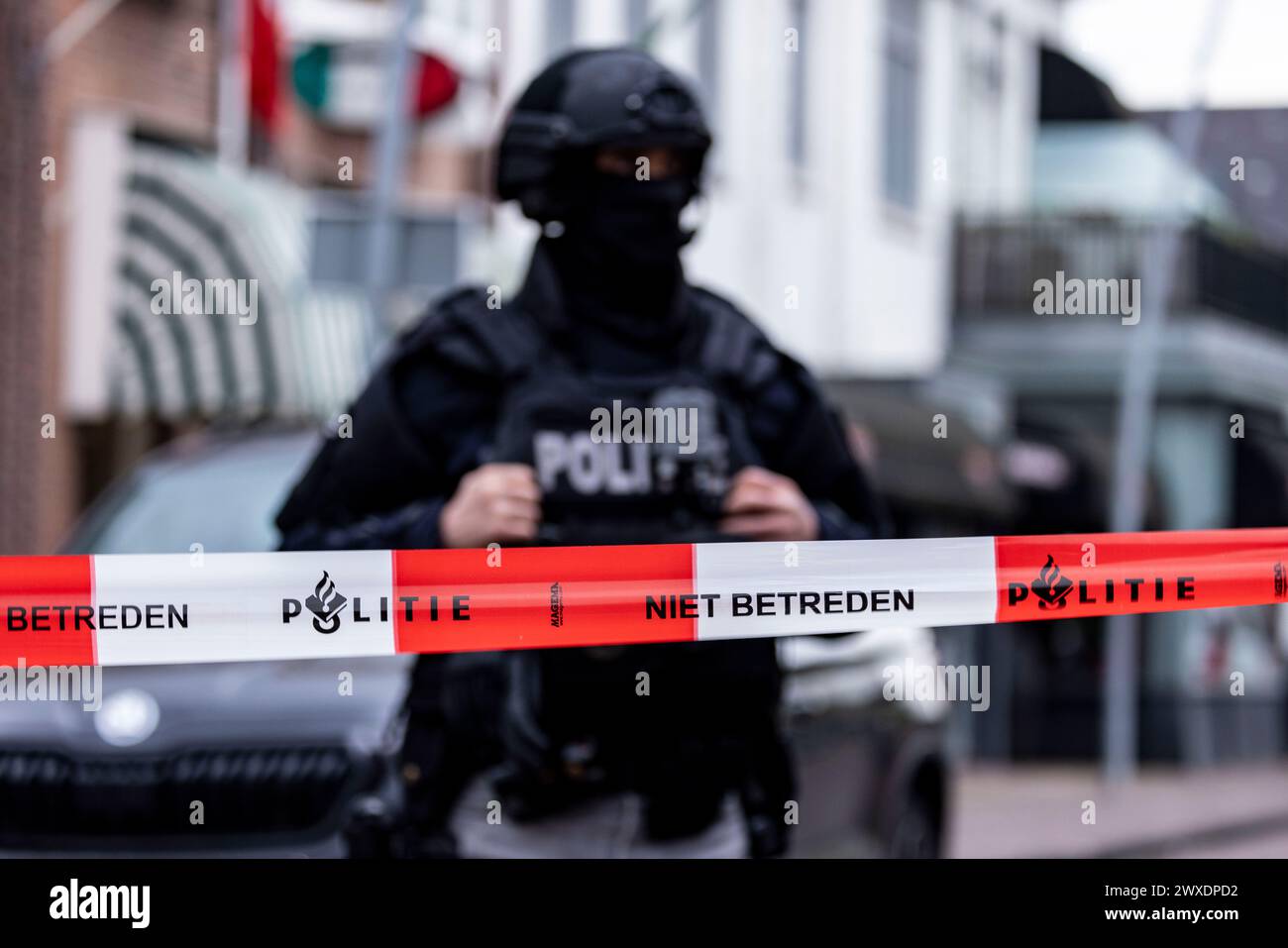 Ede, Netherlands. 30th Mar, 2024. A police officer from a Dutch special ...