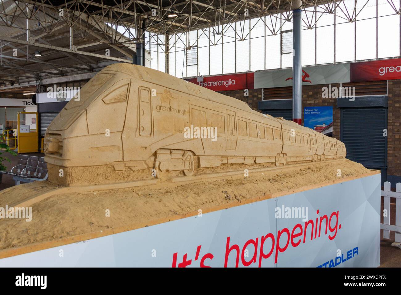 A sand sculpture of a train at Great Yarmouth railway station, Norfolk ...