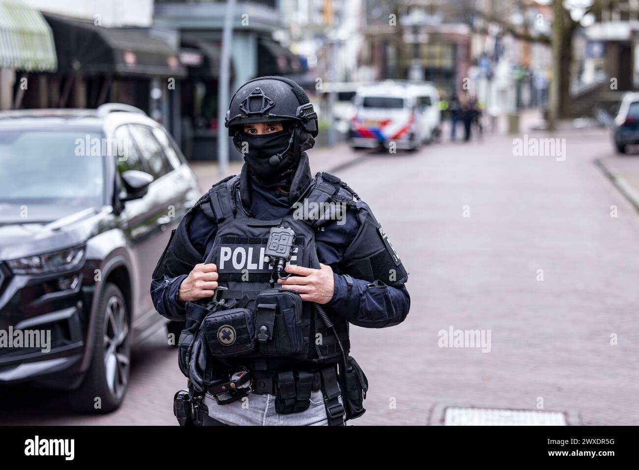 Ede, Netherlands. 30th Mar, 2024. A police officer from a Dutch special ...