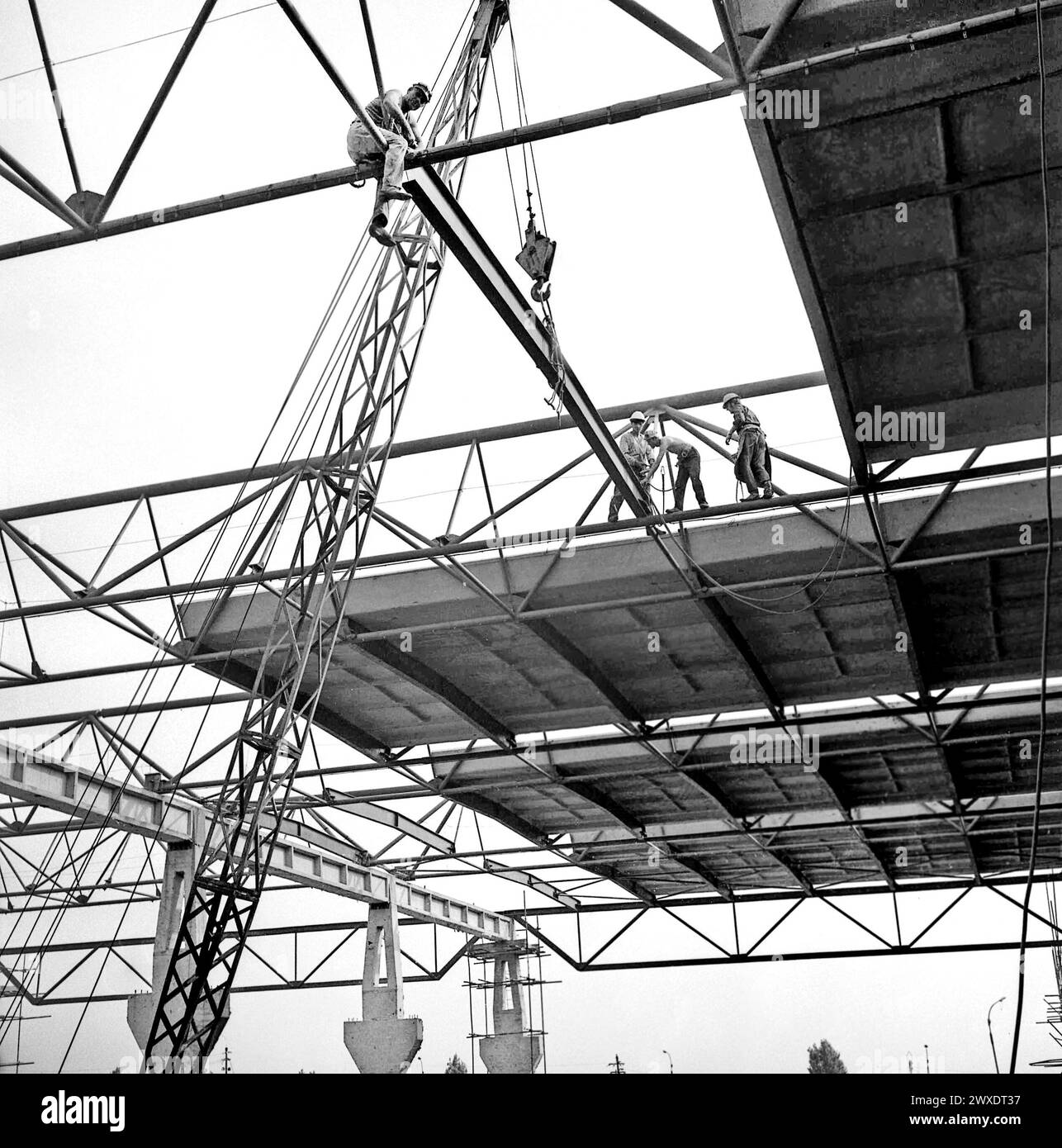 Socialist Republic of Romania in the 1970s. Workers building the large ...