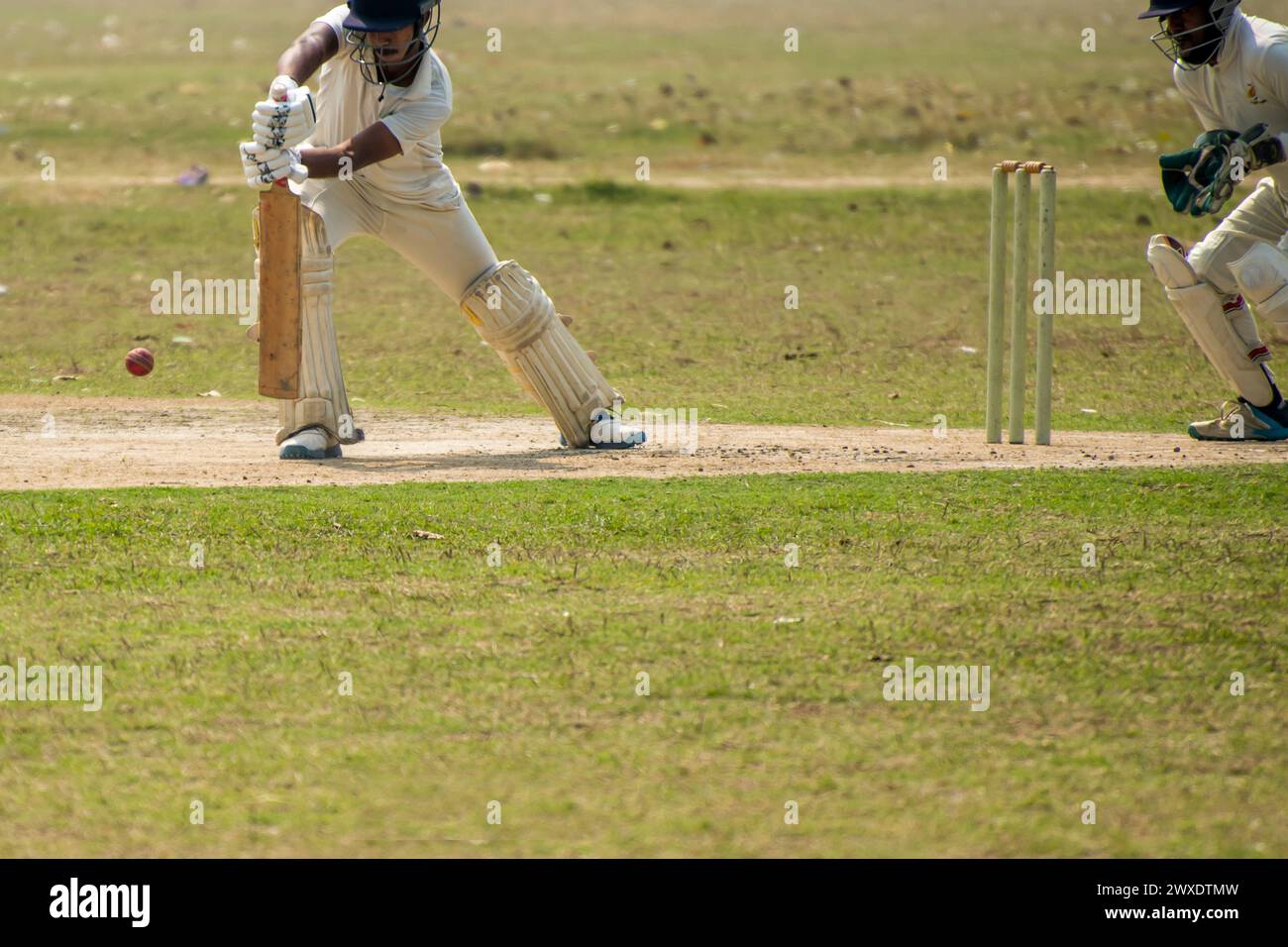 Cricket batsman is playing forward defensive stroke Stock Photo - Alamy
