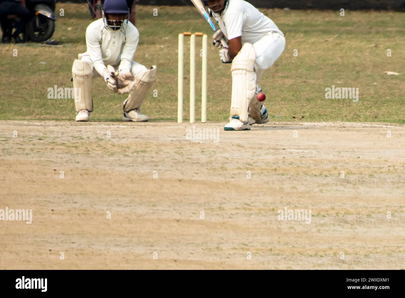 Cricket player hitting ball hi-res stock photography and images - Alamy