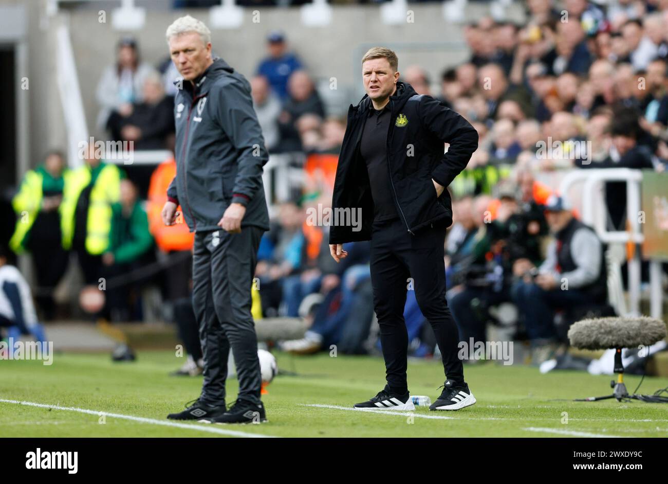 Newcastle United manager Eddie Howe (right) and West Ham United manager ...